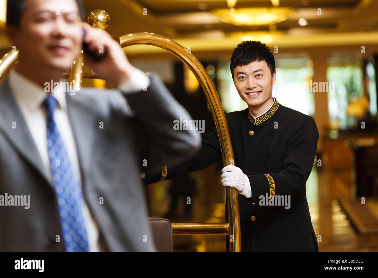 Portrait of hotel service staff Stock Photo - Alamy