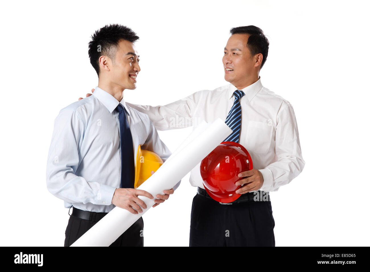 Teamwork business engineers Cut Out Stock Images & Pictures - Alamy