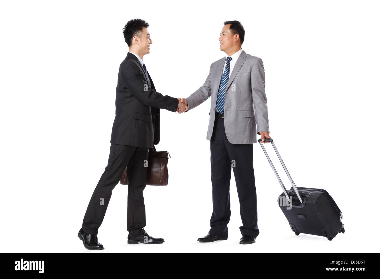 Two professional businessmen smiling Cut Out Stock Images & Pictures ...