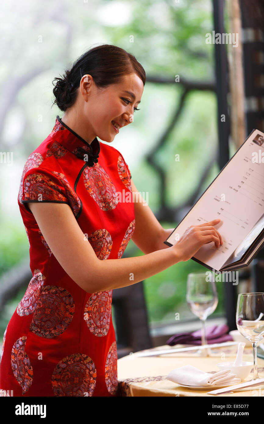 Chinese woman hotel receptionist hi-res stock photography and images ...