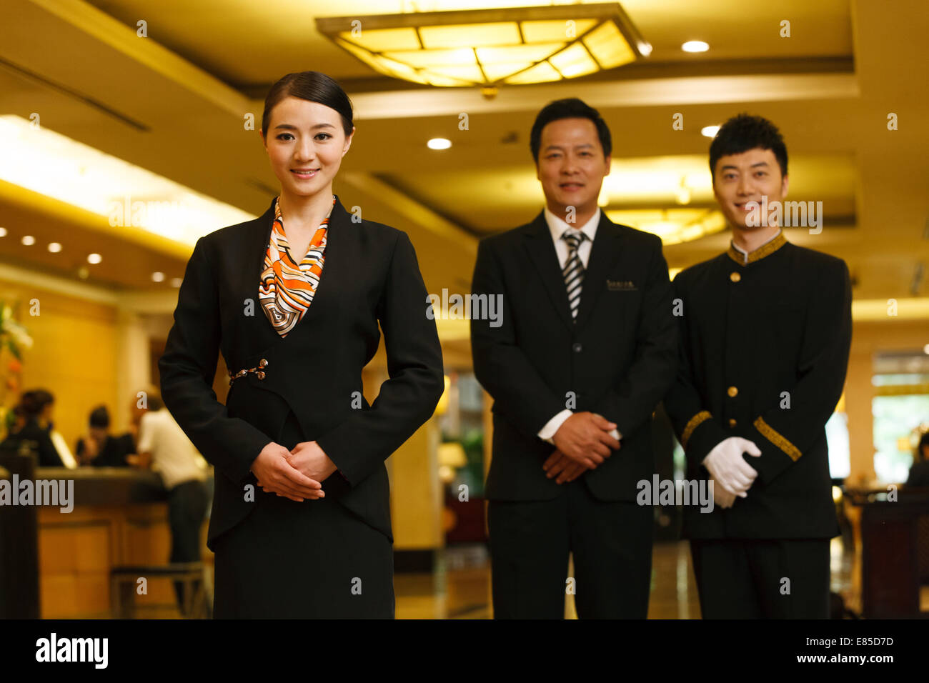 Portrait of hotel service staff Stock Photo - Alamy