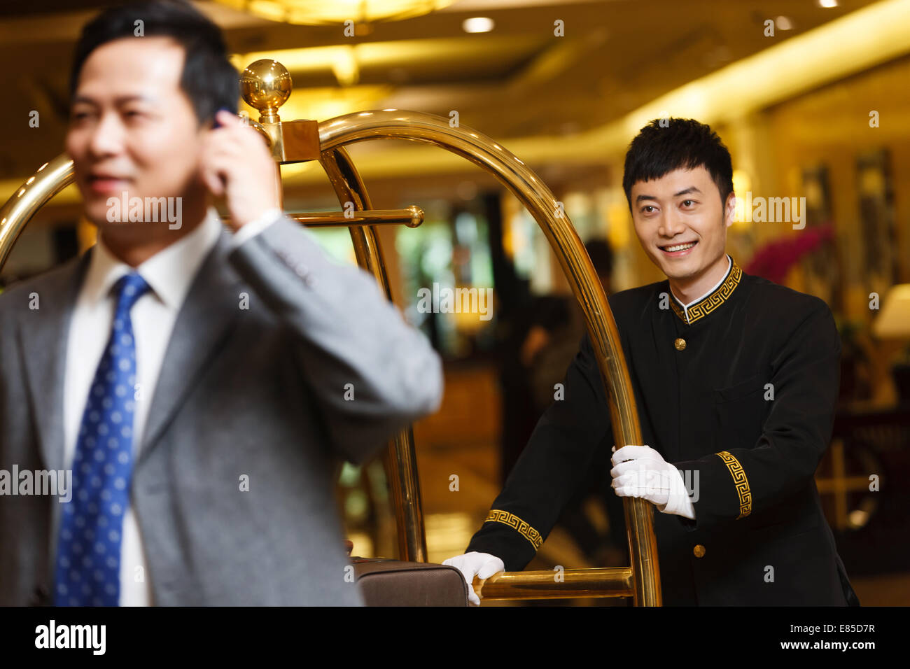 Portrait of hotel service staff Stock Photo - Alamy