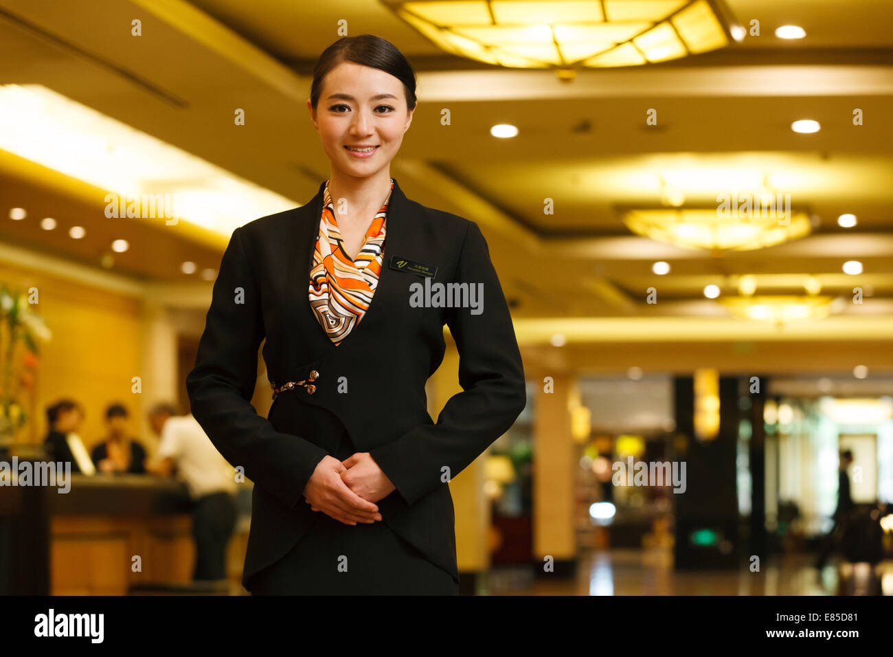 Portrait of hotel service staff Stock Photo - Alamy