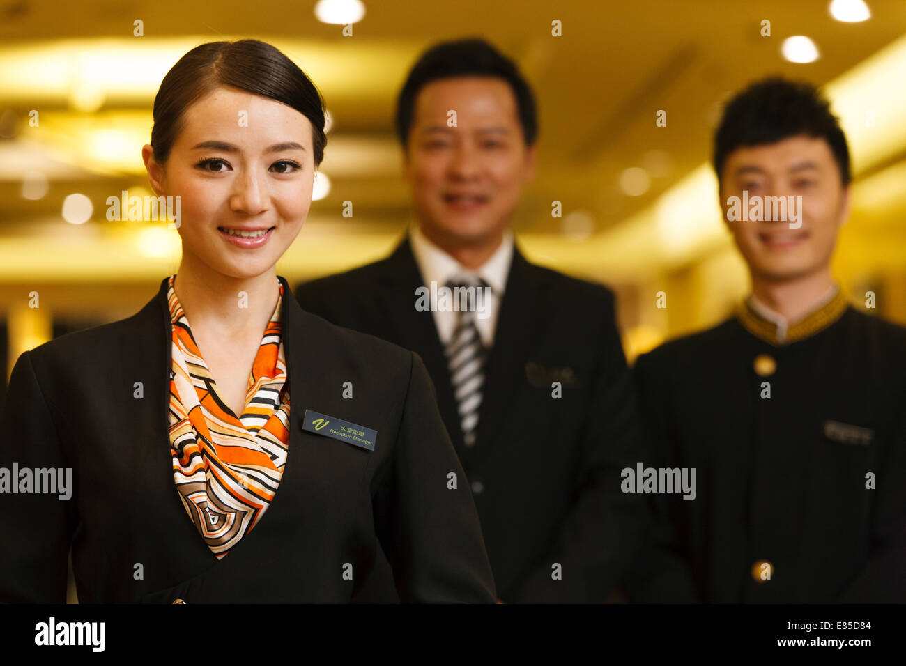 Portrait of hotel service staff Stock Photo - Alamy