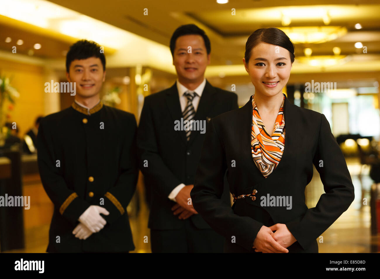 Portrait of hotel service staff Stock Photo - Alamy