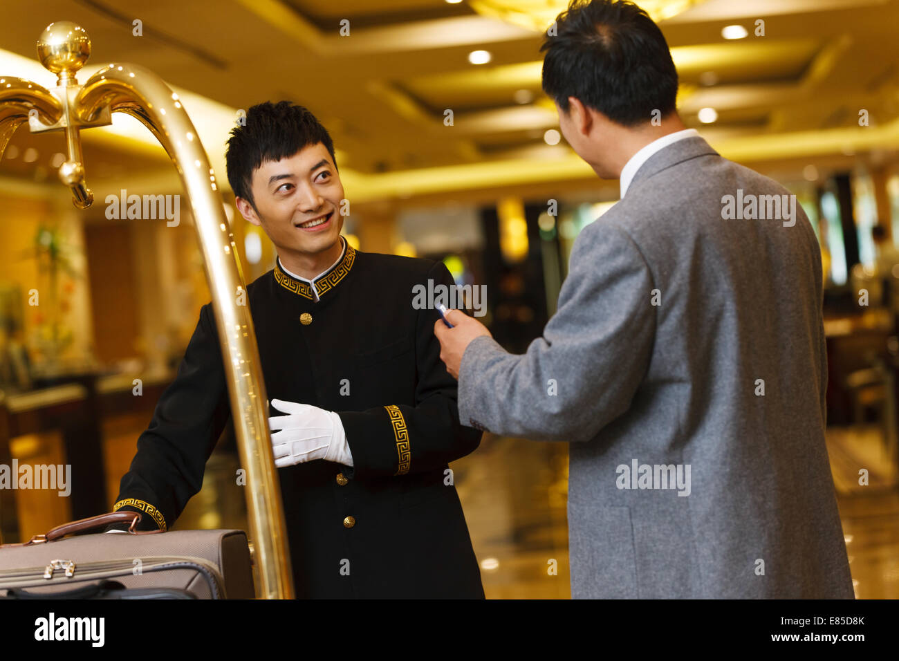 Hotel service staff Stock Photo - Alamy
