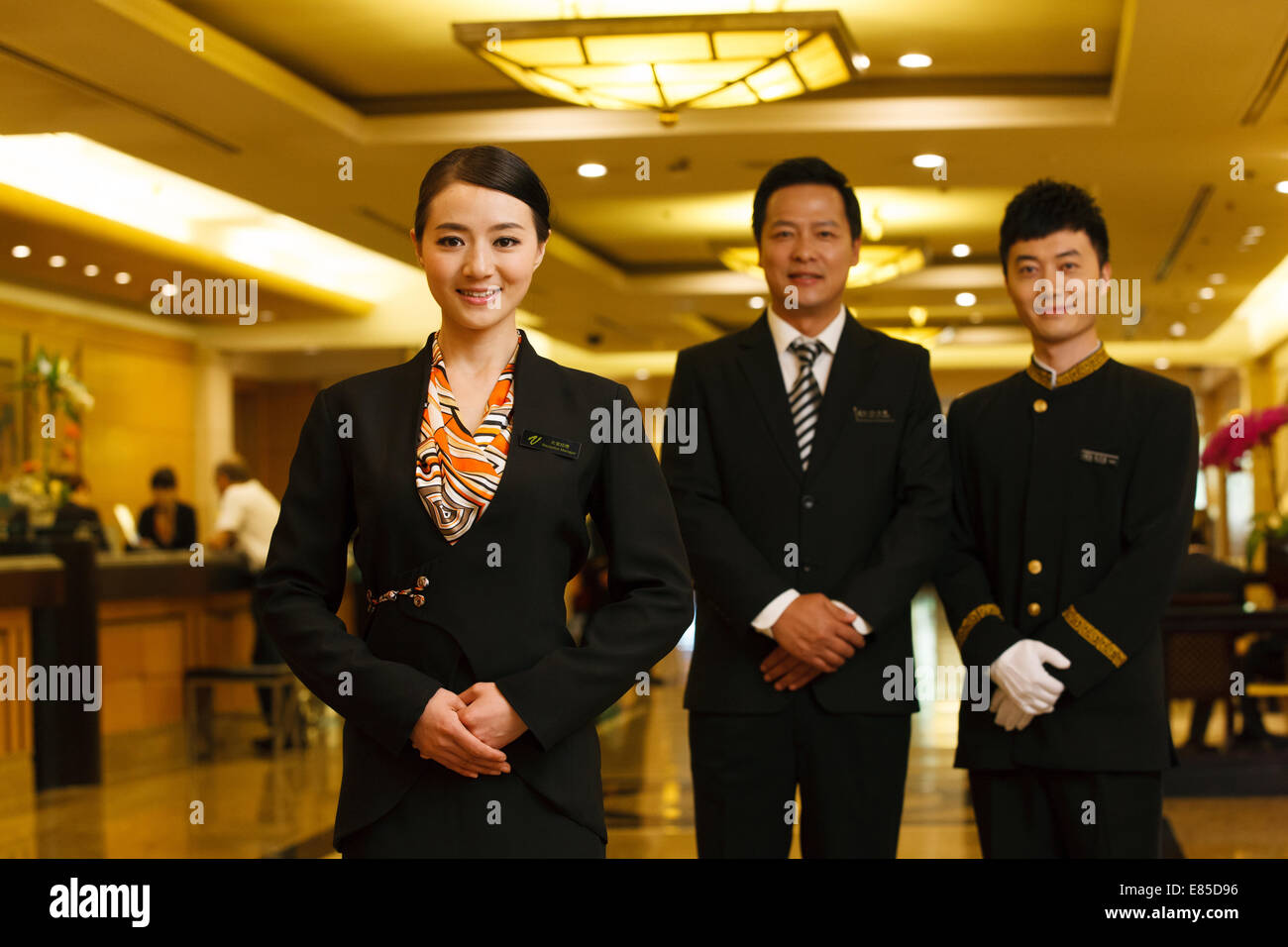Portrait of hotel service staff Stock Photo - Alamy