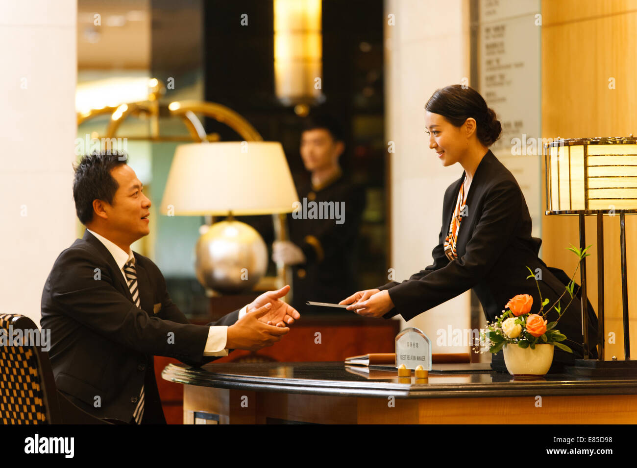 Hotel reception customer manager hi-res stock photography and images ...