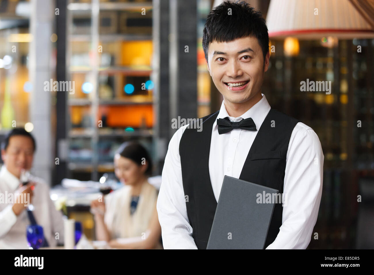 Portrait of hotel service staff Stock Photo - Alamy