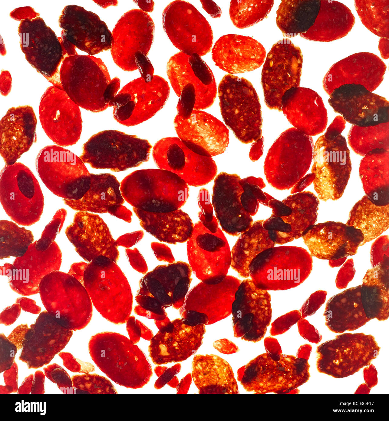 A different sizes of the salami slices on the white background Stock ...