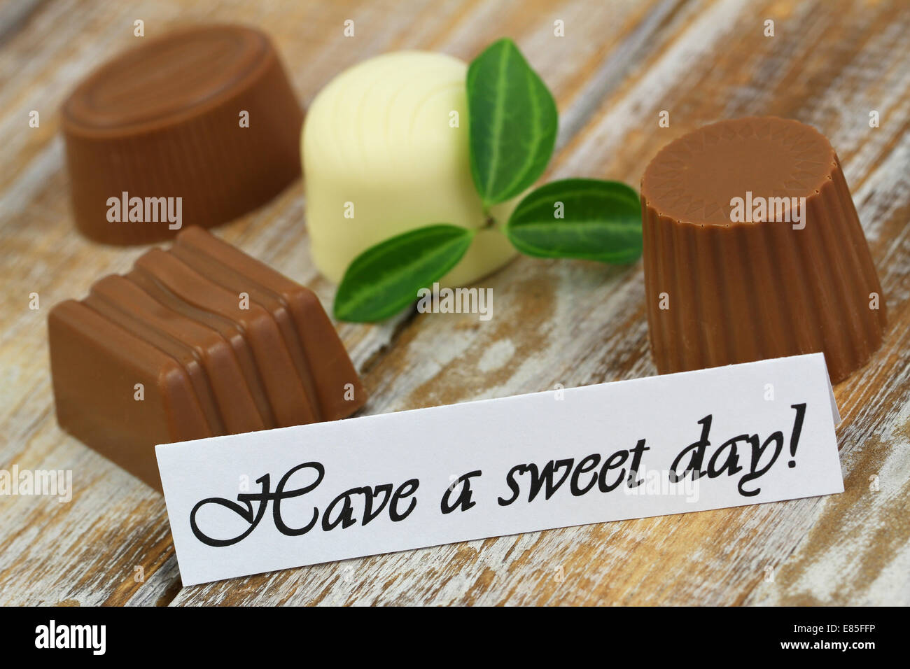 Have a sweet day card with assorted chocolates Stock Photo - Alamy