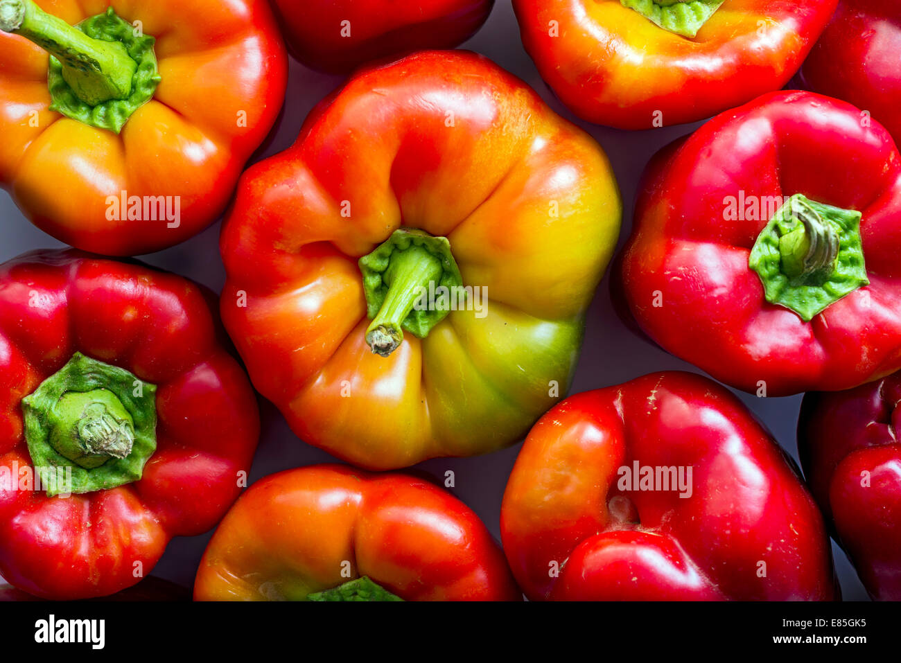 Vibrant stack of red peppers Stock Photo - Alamy