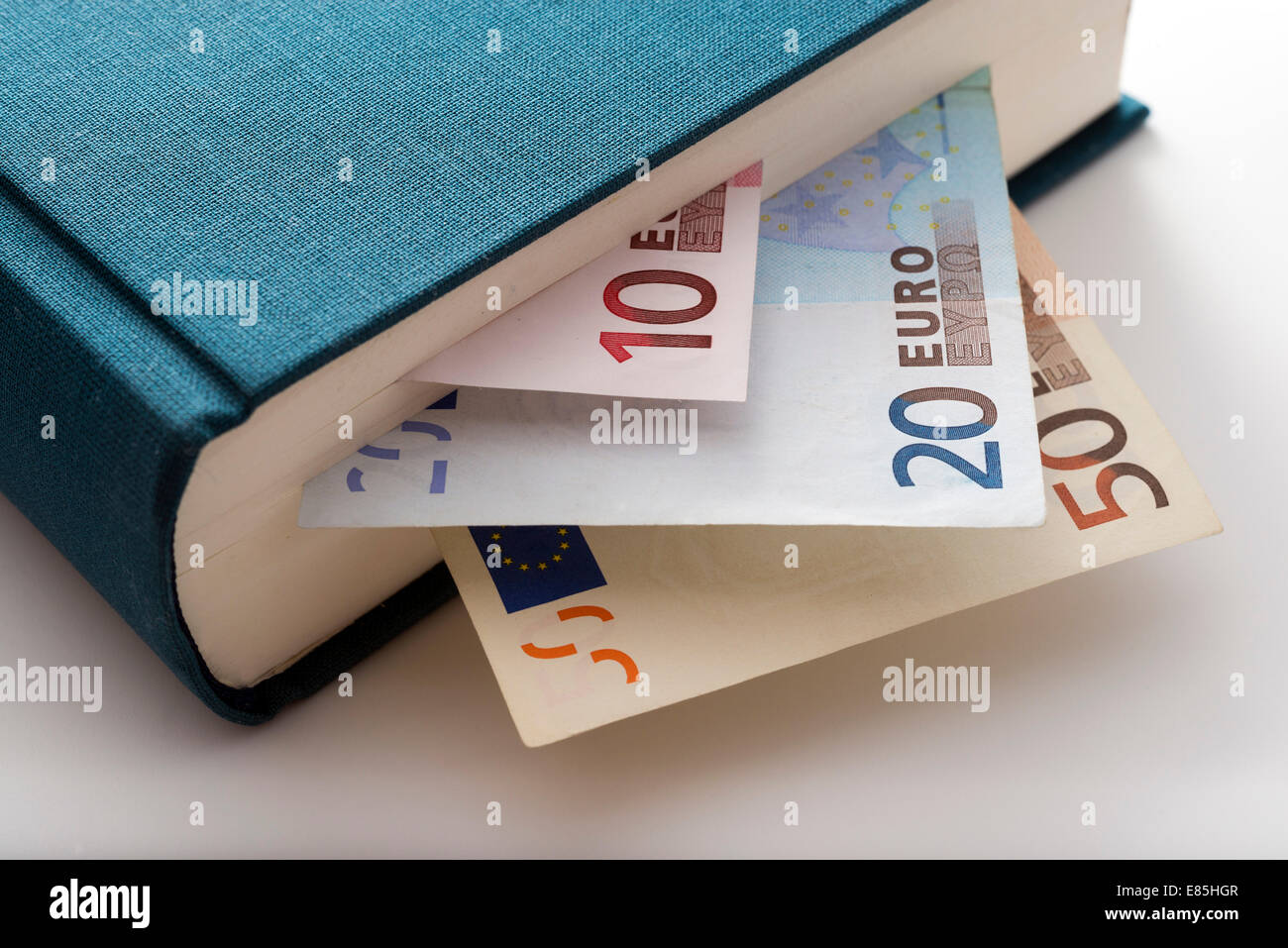 euro bill in a blue book Stock Photo - Alamy