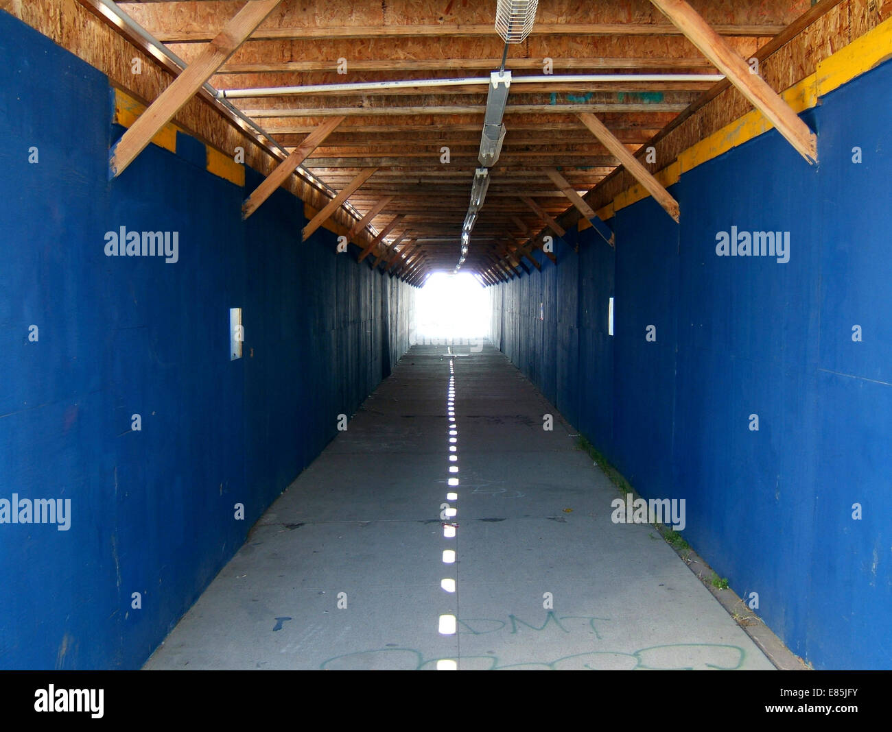 Blue tunnel with light at the end Stock Photo - Alamy