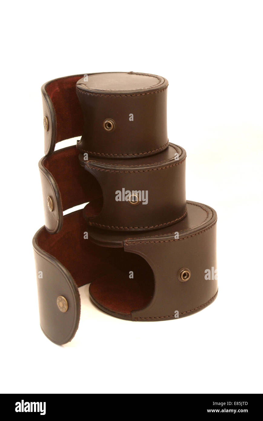 Leather reel holders for fly fishing Stock Photo - Alamy