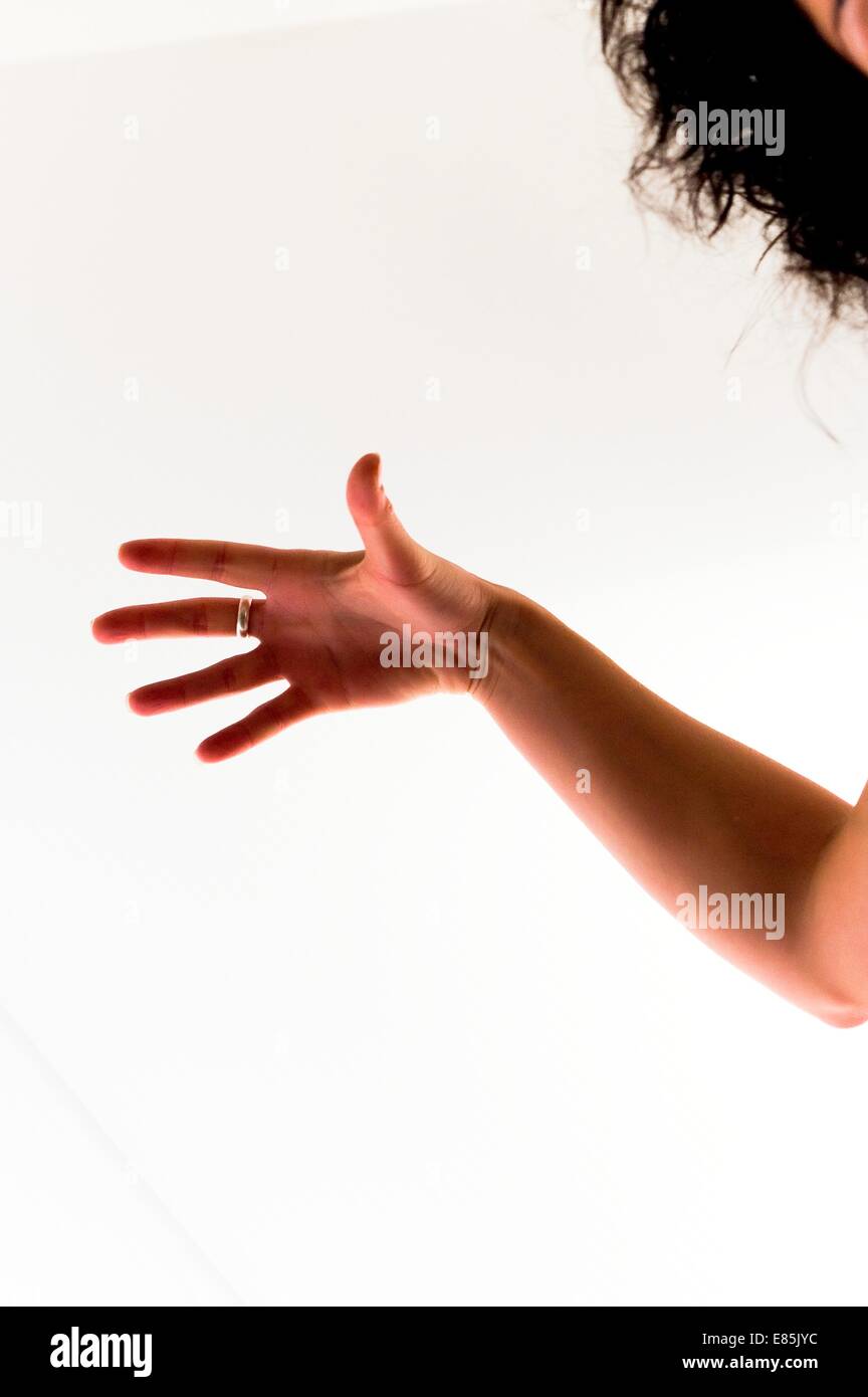 Woman's hand and part of her hair Stock Photo - Alamy