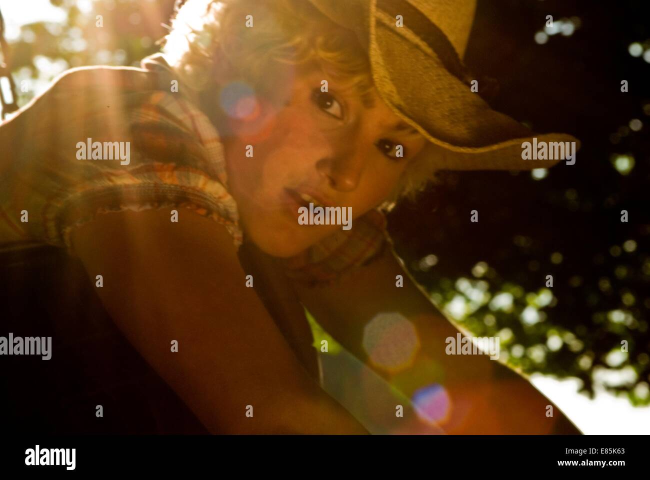 Side profile of a woman in a cowboy hat Stock Photo - Alamy