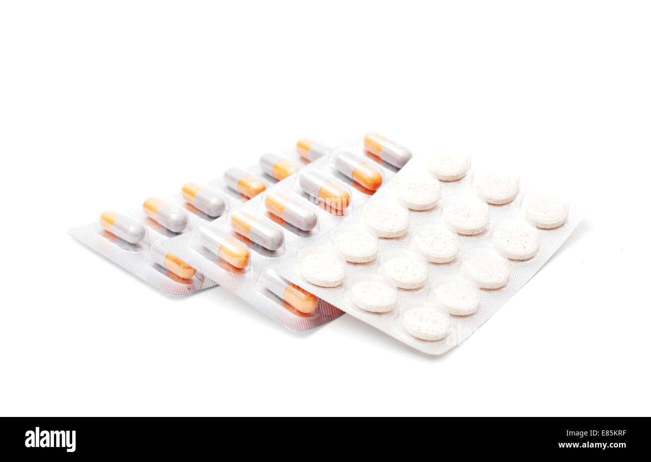 blister packs of pills isolated on the white background Stock Photo - Alamy