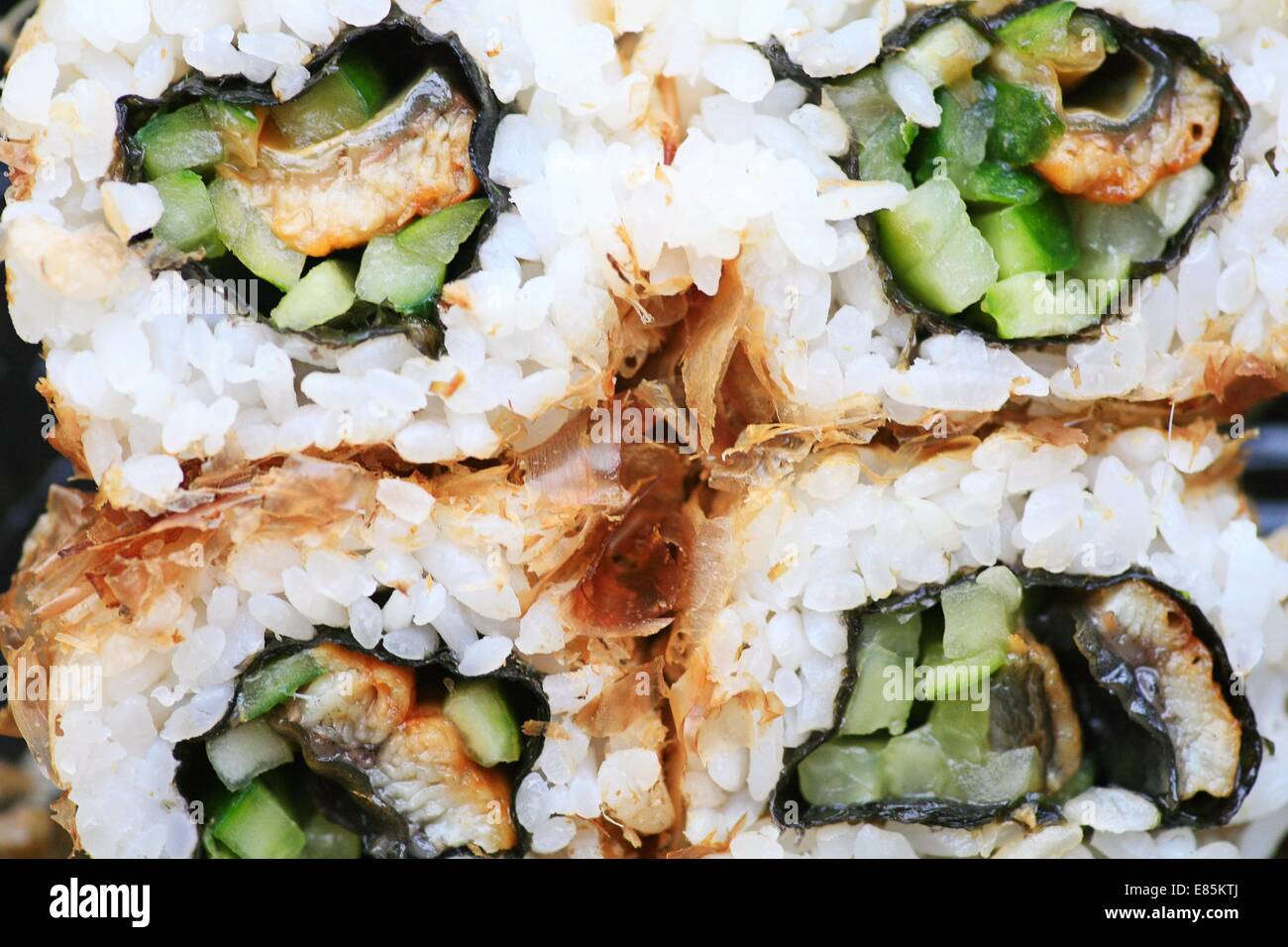 Four sushi rolls with chopsticks hi-res stock photography and images ...