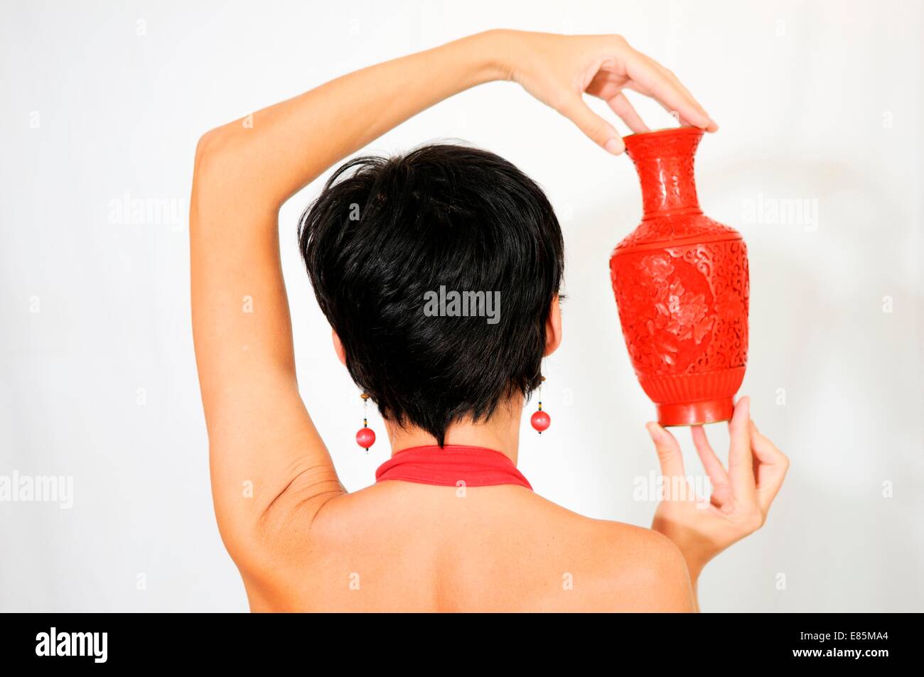 Woman with vase Stock Photo - Alamy