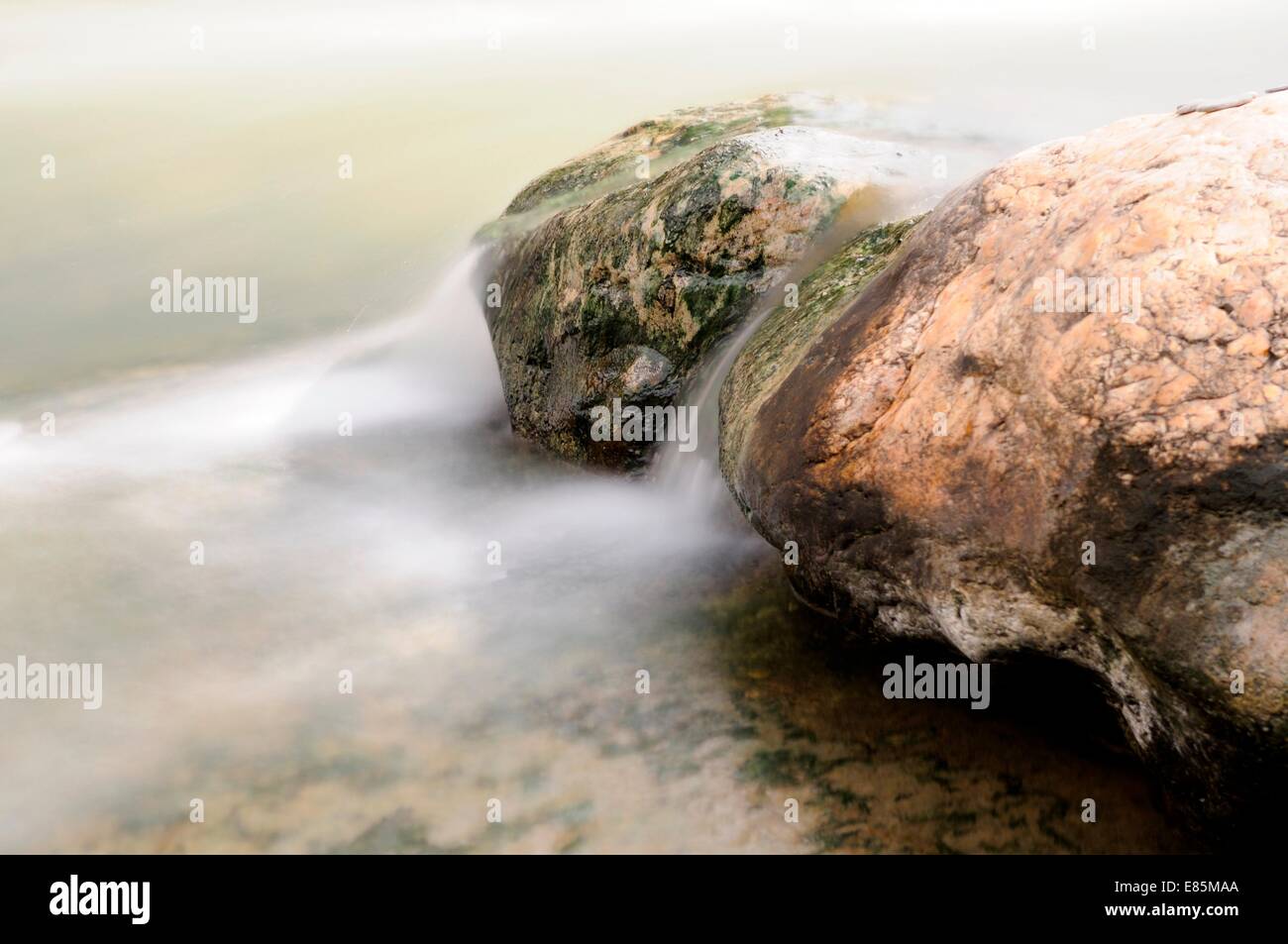 Rocks in a stream Stock Photo - Alamy