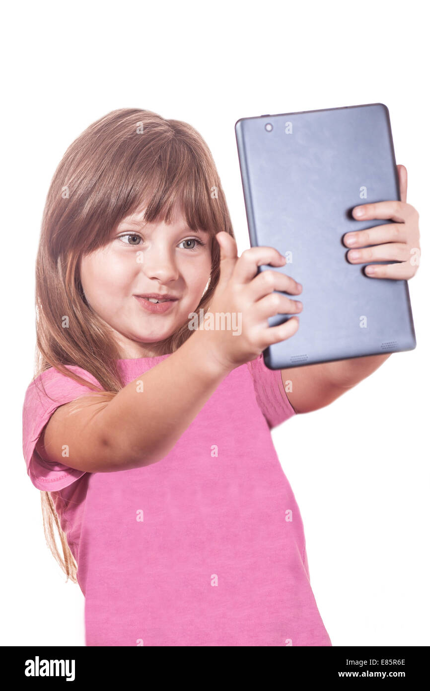The child's photo with the tablet computer Stock Photo - Alamy