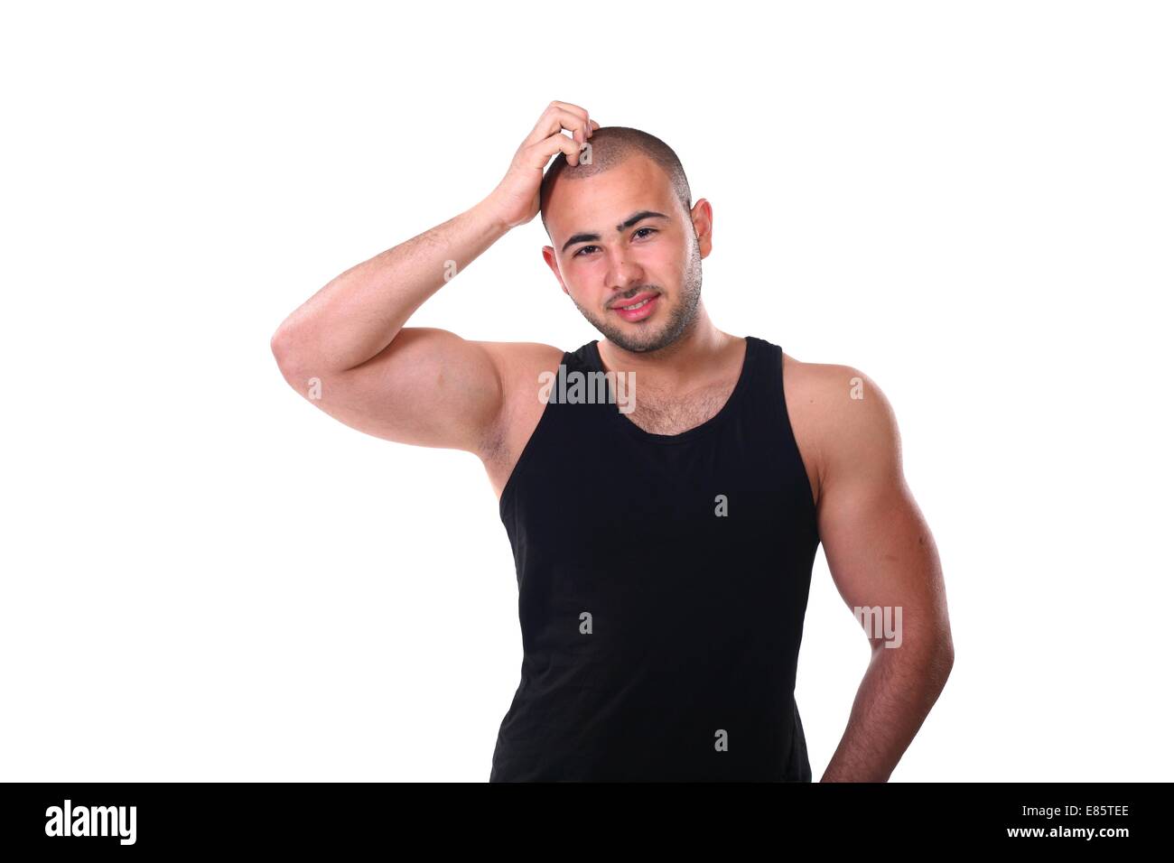strong latino man 20-25 years in studio on white background Stock Photo ...