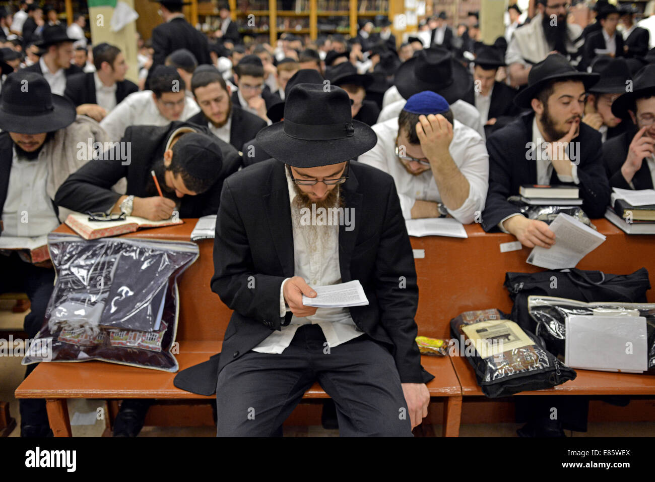 A group of religious Jewish boys studying at a synagogue in Crown ...