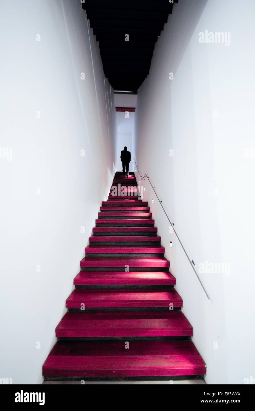 Staircase with isolated figure Stock Photo - Alamy