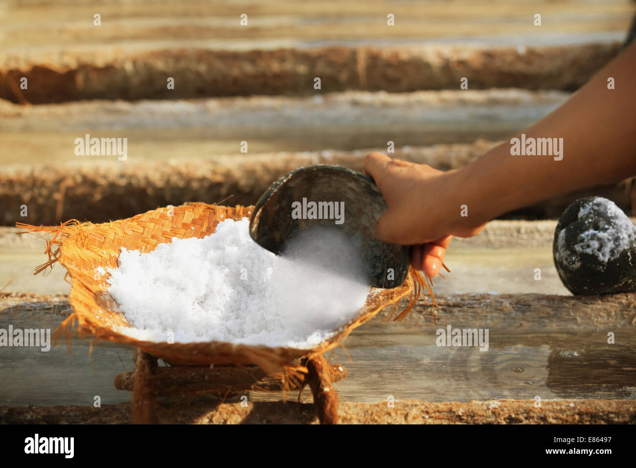 Work on the production of salt, the traditional method. Bali, Indonesia ...