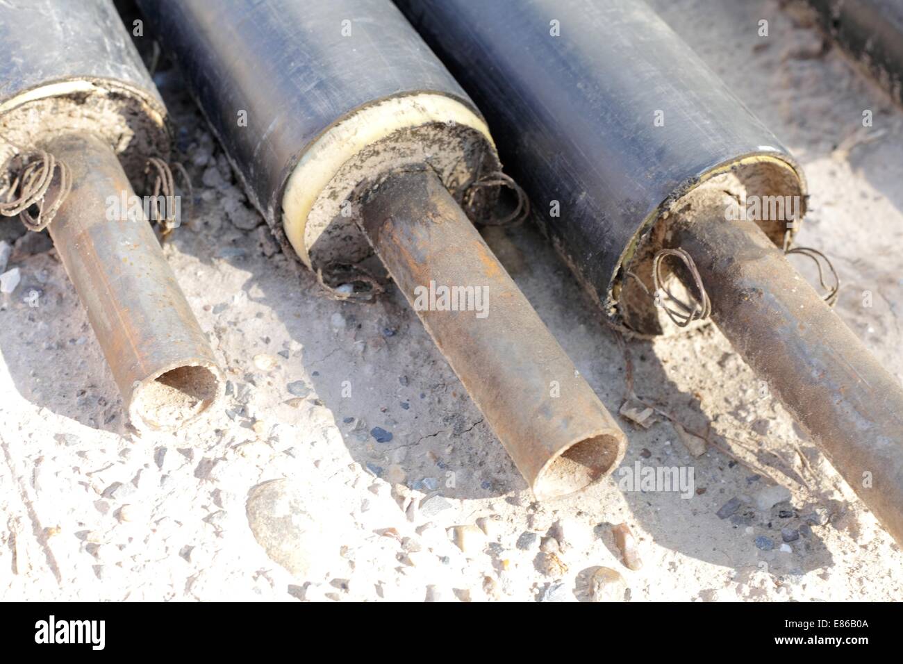 Set of a sewer pipes on the ground closeup Stock Photo - Alamy