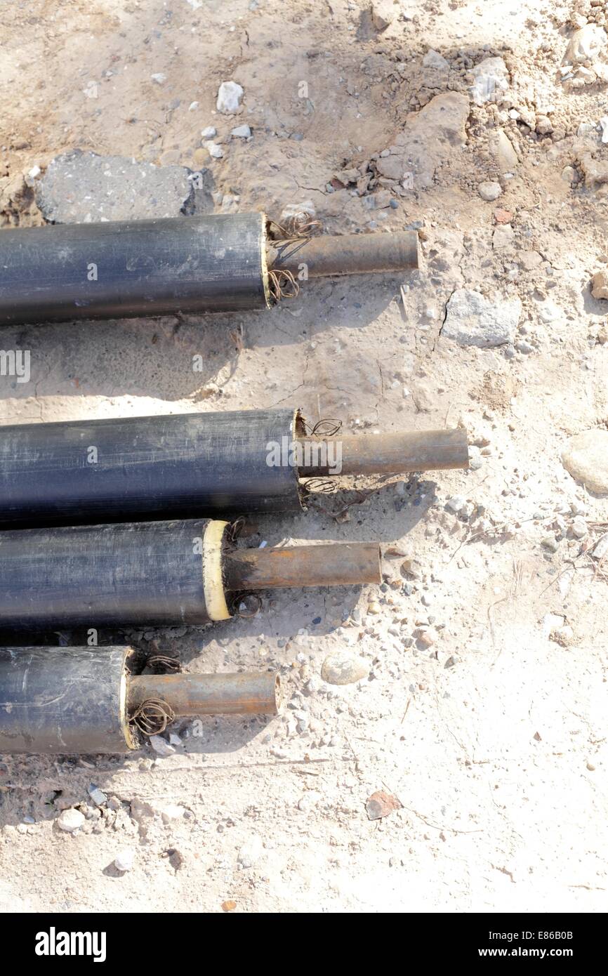 Set of a sewer pipes on the ground closeup Stock Photo - Alamy