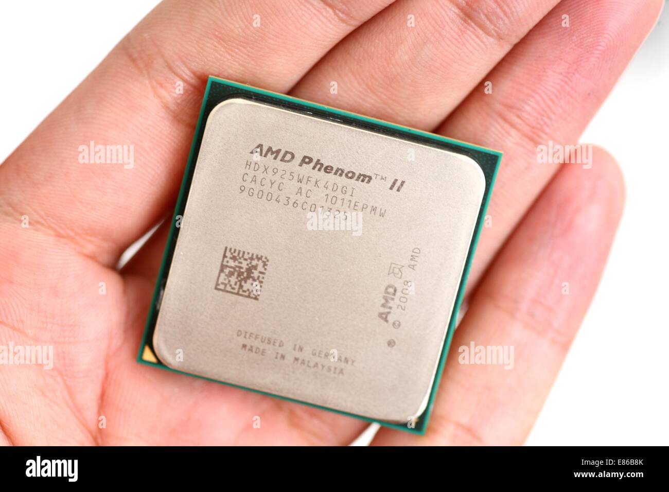 Closeup of a computer processor over a white background Stock Photo - Alamy