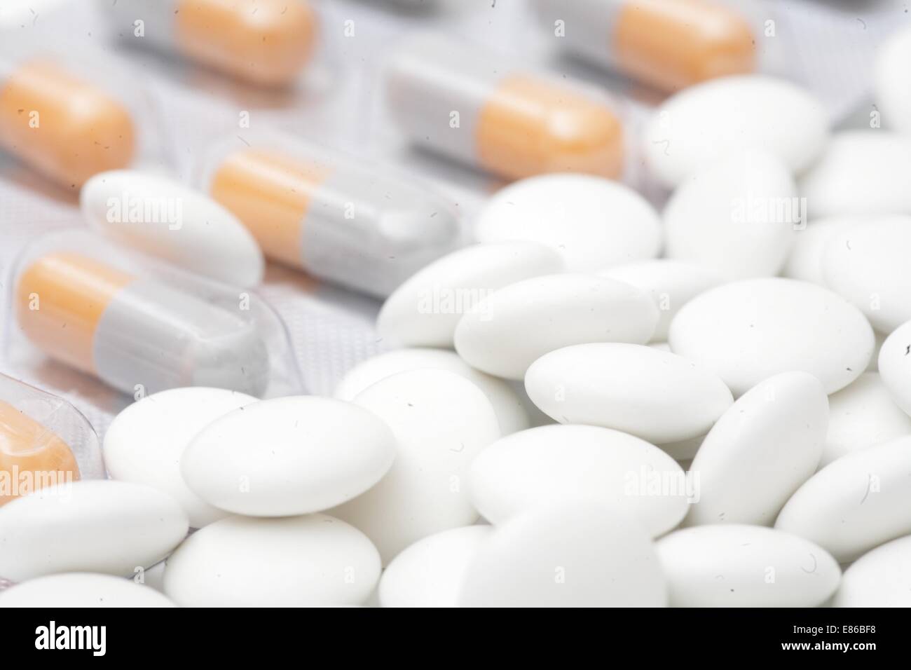 heap of pills isolated on the white background Stock Photo - Alamy