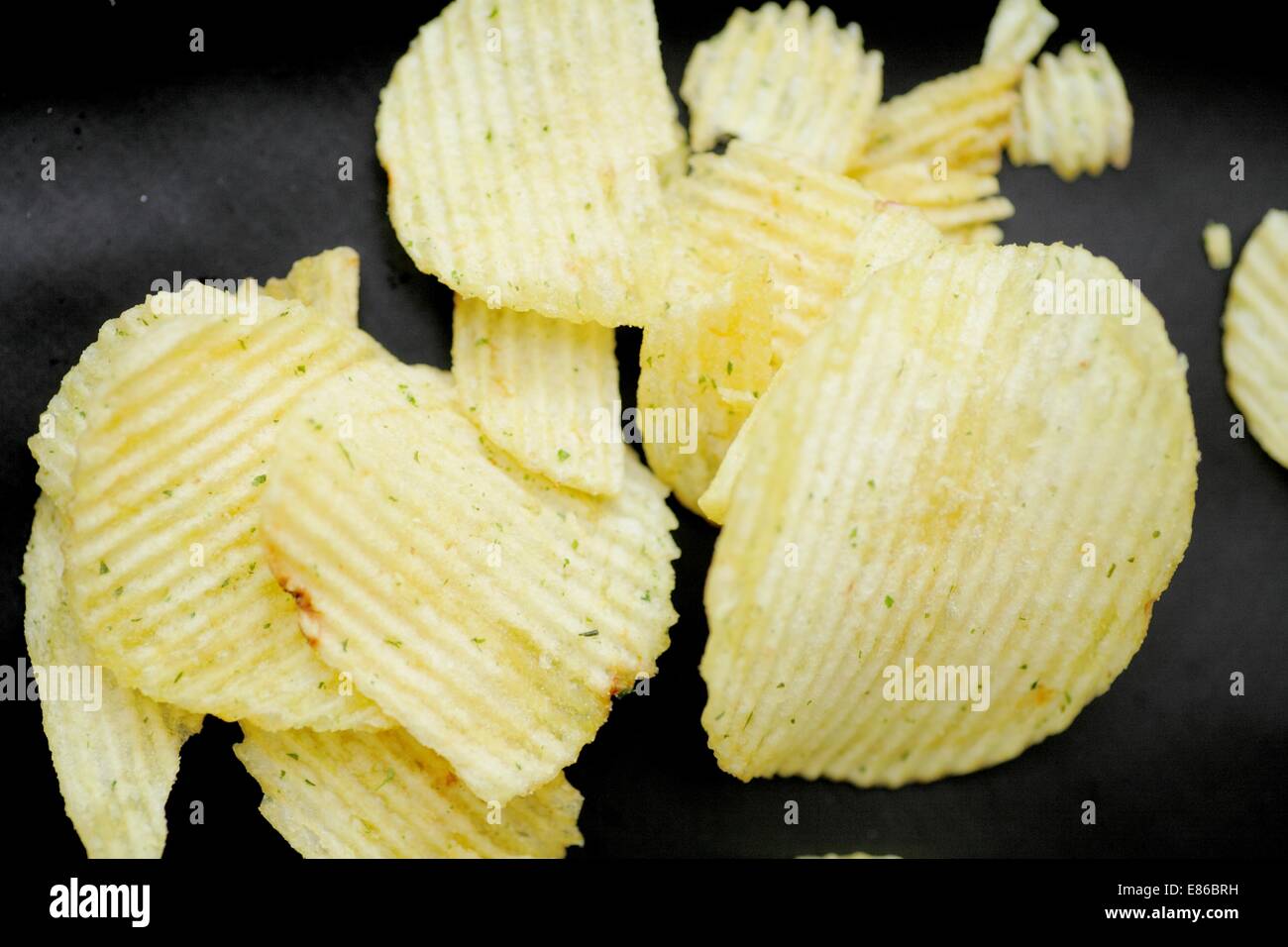 Potato chips closeup texture shot Stock Photo - Alamy