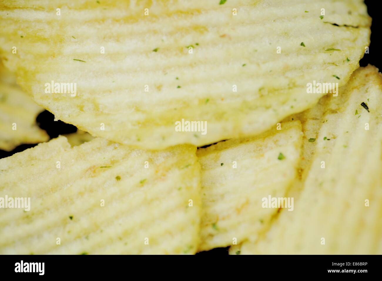 Potato chips closeup texture shot Stock Photo - Alamy