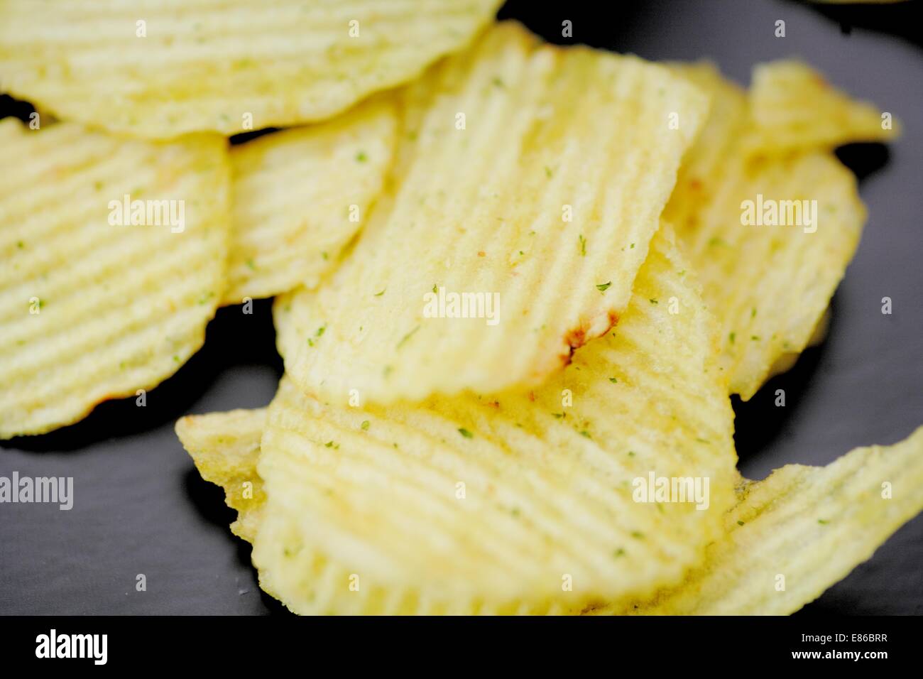 Potato chips closeup texture shot Stock Photo - Alamy