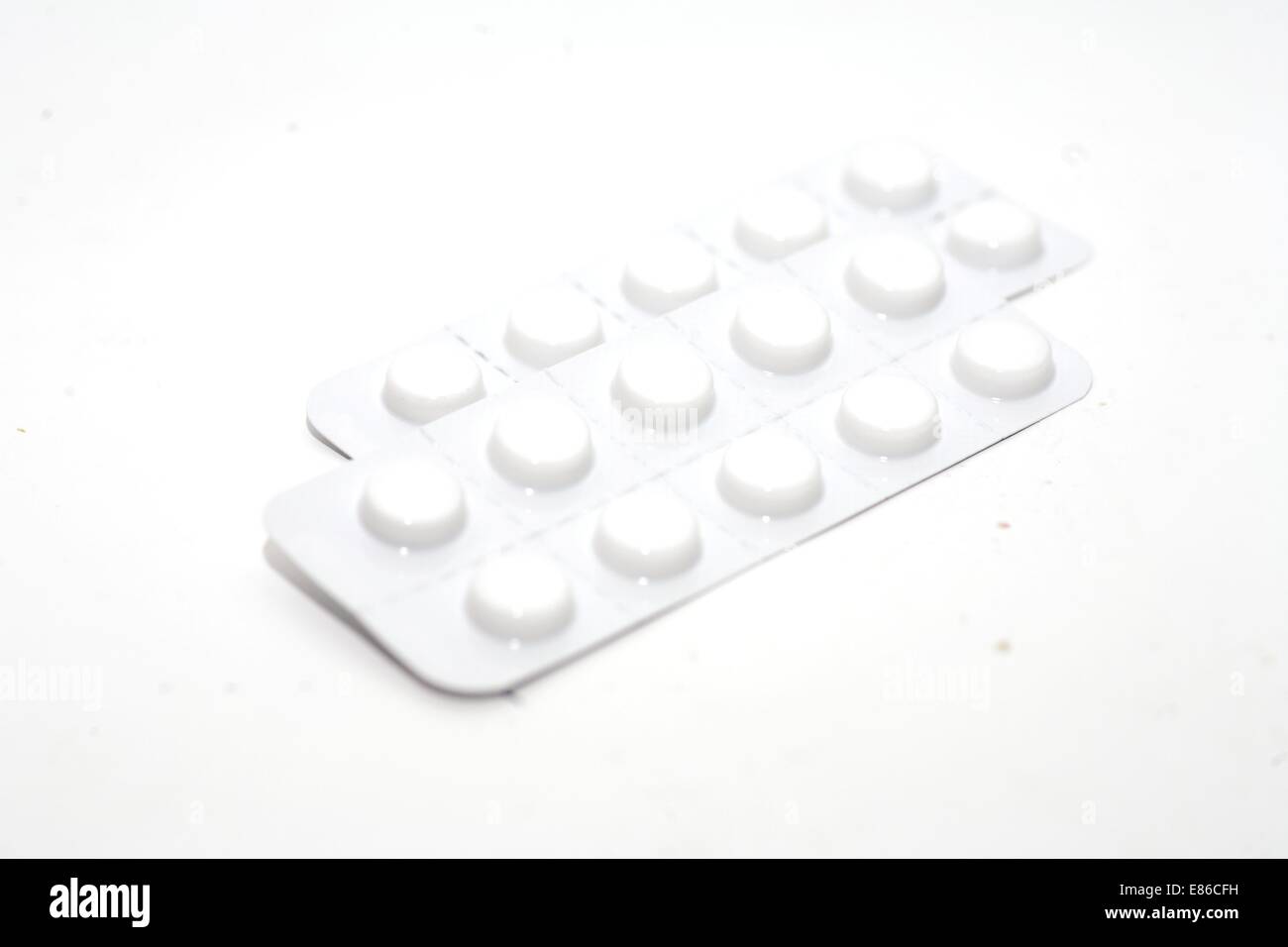 Pack of pills isolated on white background Stock Photo - Alamy
