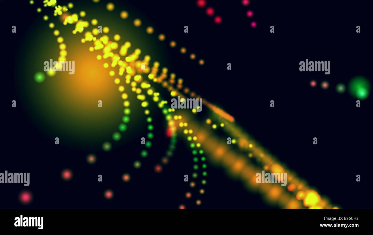 Close up on the ends of many illuminated fiber optic strands on blur ...