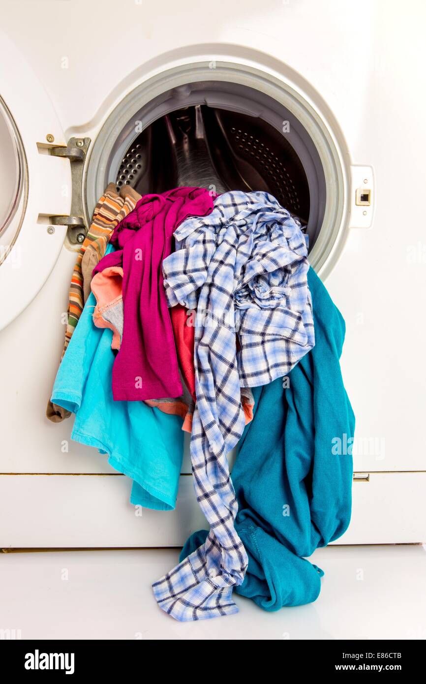 Washing machine with clean linen Stock Photo - Alamy