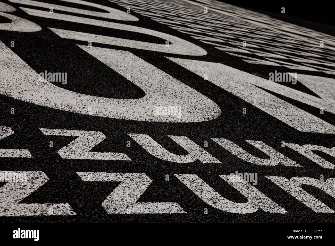 Writing on the ground in Lisbon Stock Photo - Alamy