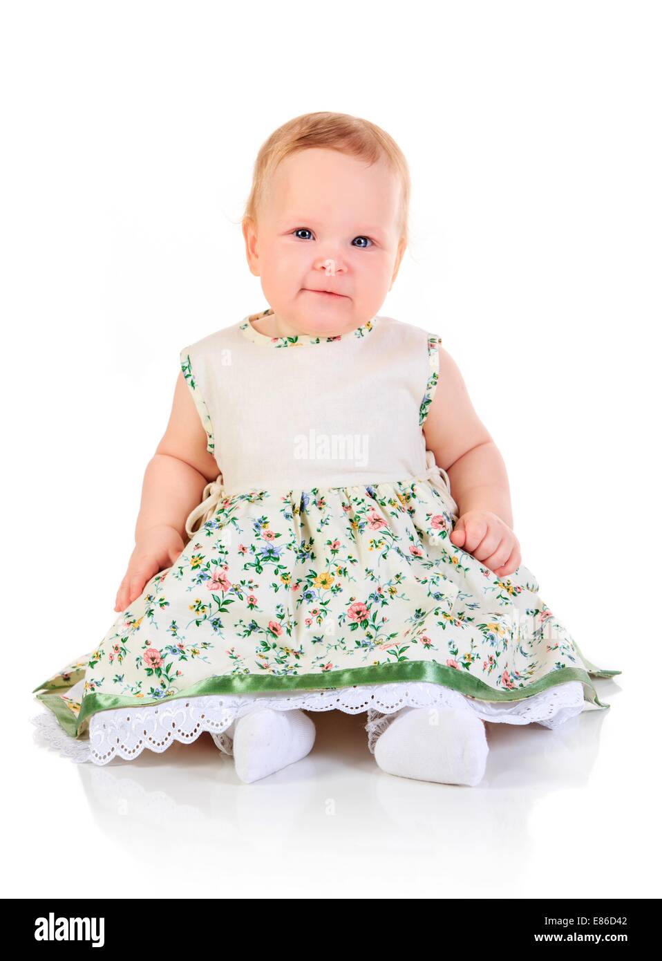 one years old baby girl on a white background Stock Photo - Alamy
