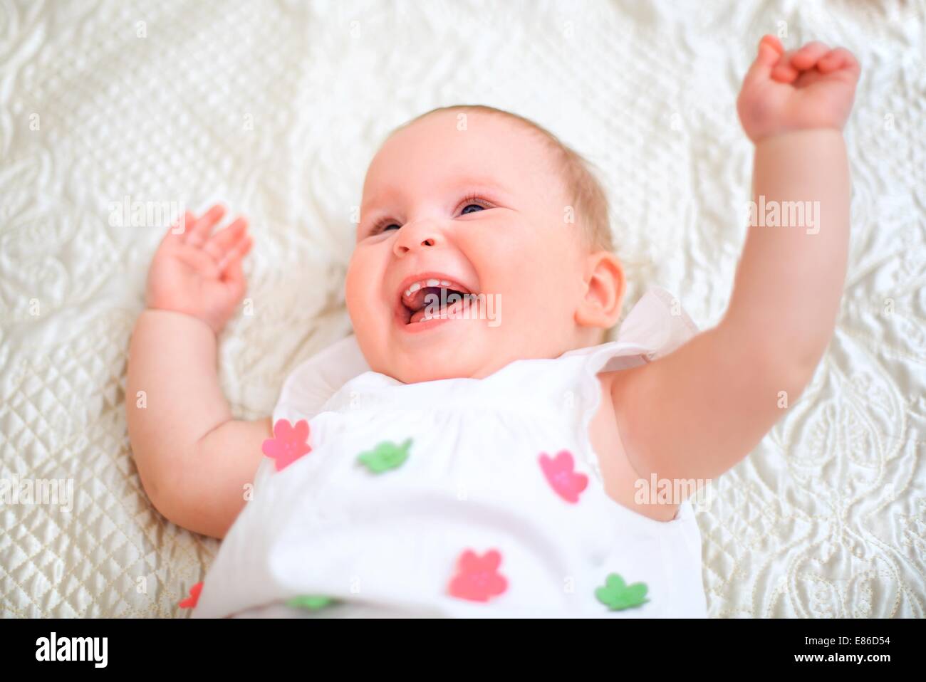 one years old baby girl on a light background Stock Photo - Alamy