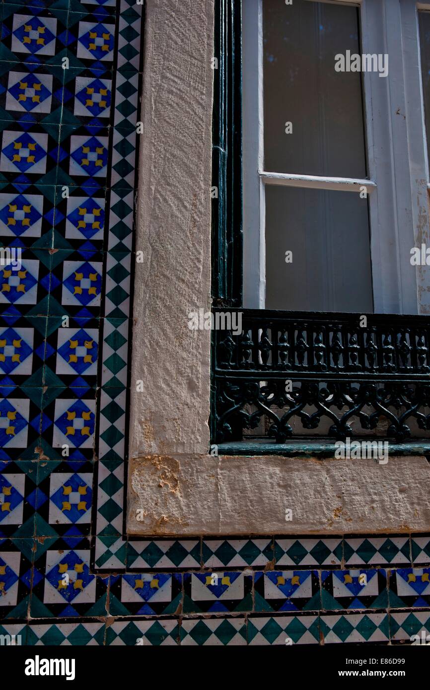 Window surrounded with mosaic tiles Stock Photo - Alamy