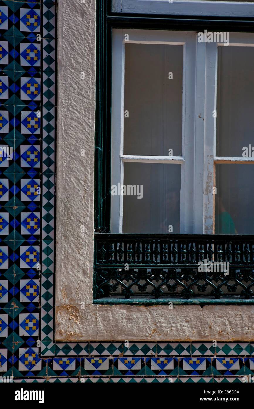 Window surrounded with mosaic tiles Stock Photo - Alamy