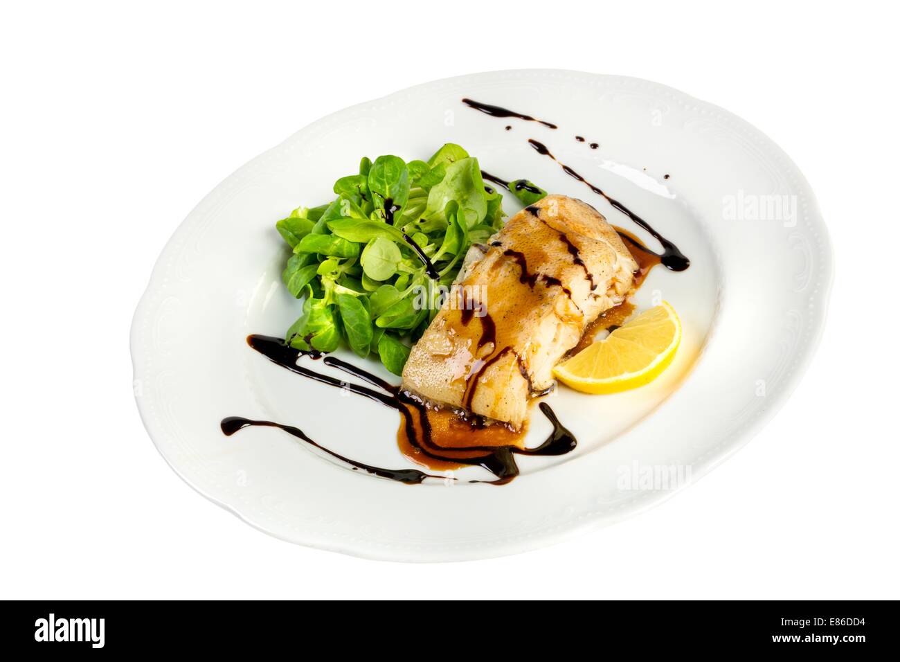 roast fish isolated on a white background Stock Photo - Alamy