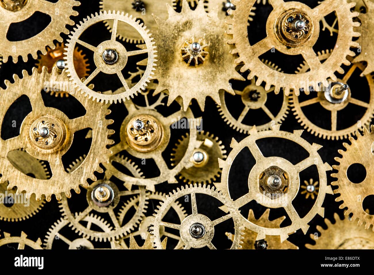 close up old mechanism on a black background Stock Photo - Alamy