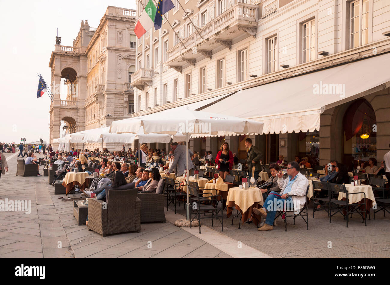 People relaxing at a cafe in Piazza Unita D'Italia Trieste Italy Stock ...
