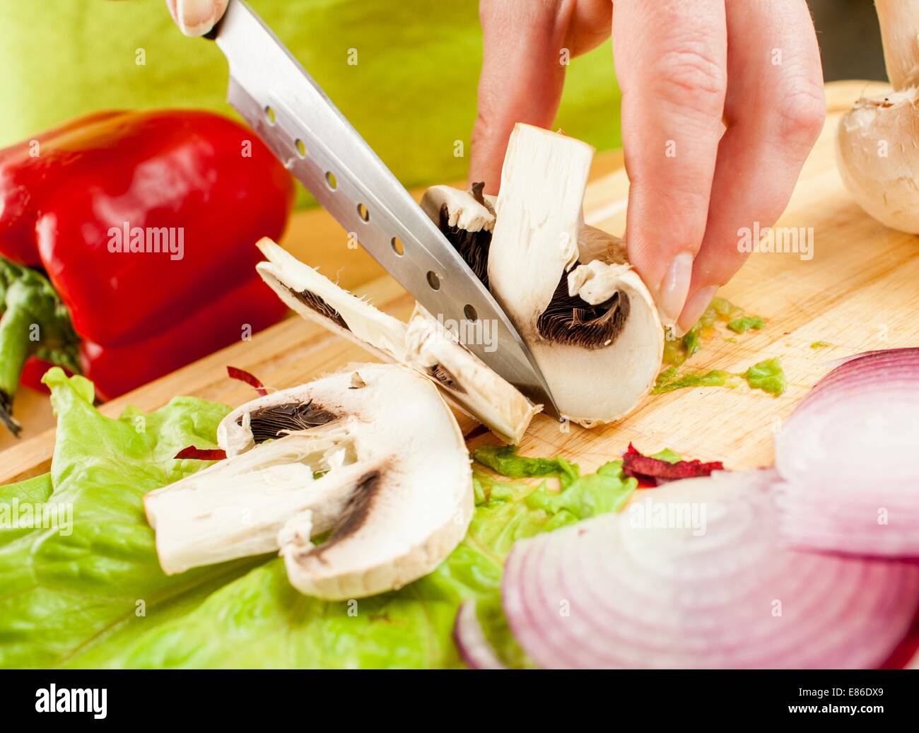 Womans hands cutting mushroom hi-res stock photography and images - Alamy