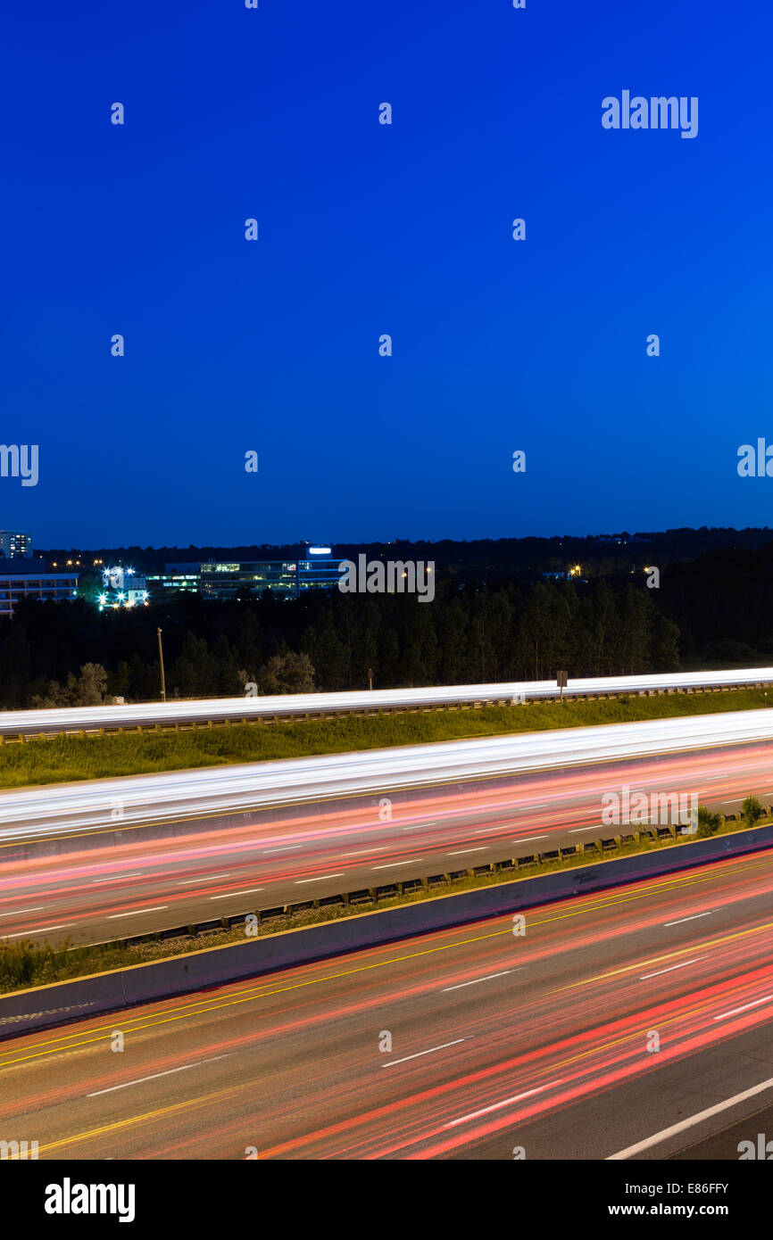 Side view of a motorway at dusk with copy space Stock Photo - Alamy